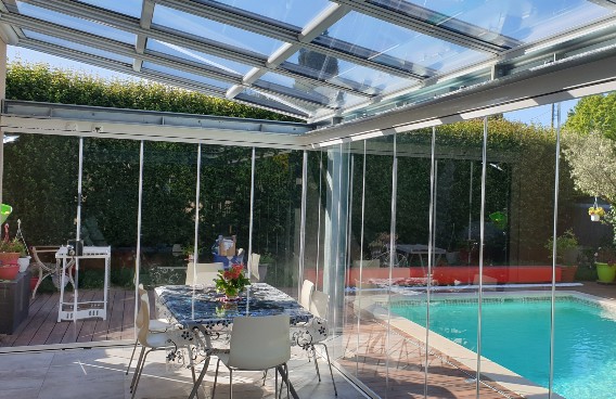 Le rideau de verre en fermeture de véranda - COPROBAT